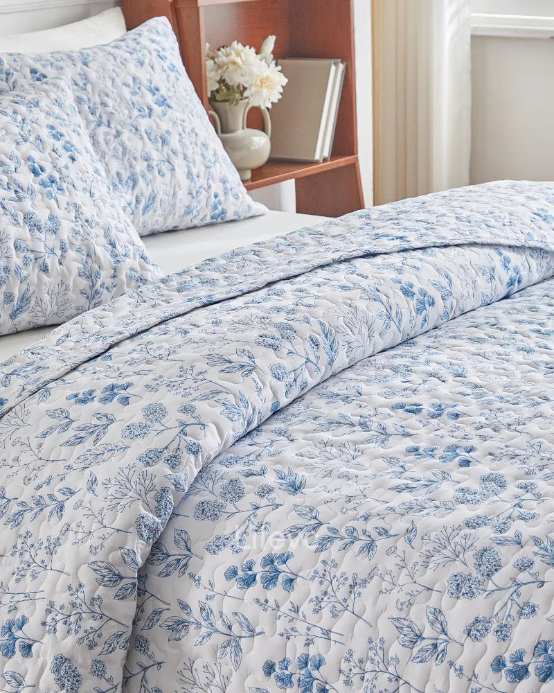 light blue patterned quilt